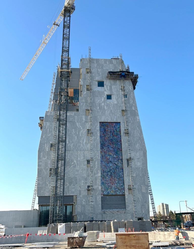 Photos reveal construction progress on granite-wrapped Obama ...