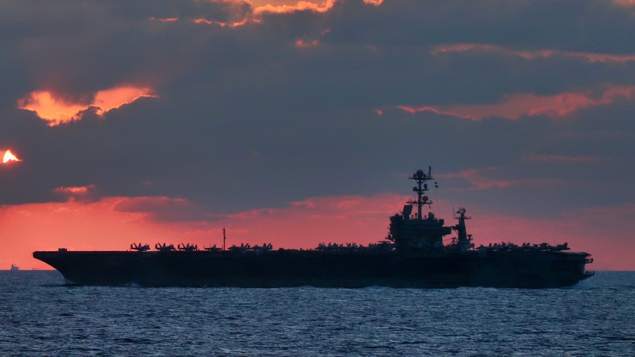 A Russian Submarine Surfaced Directly in Front of a Navy Aircraft Carrier