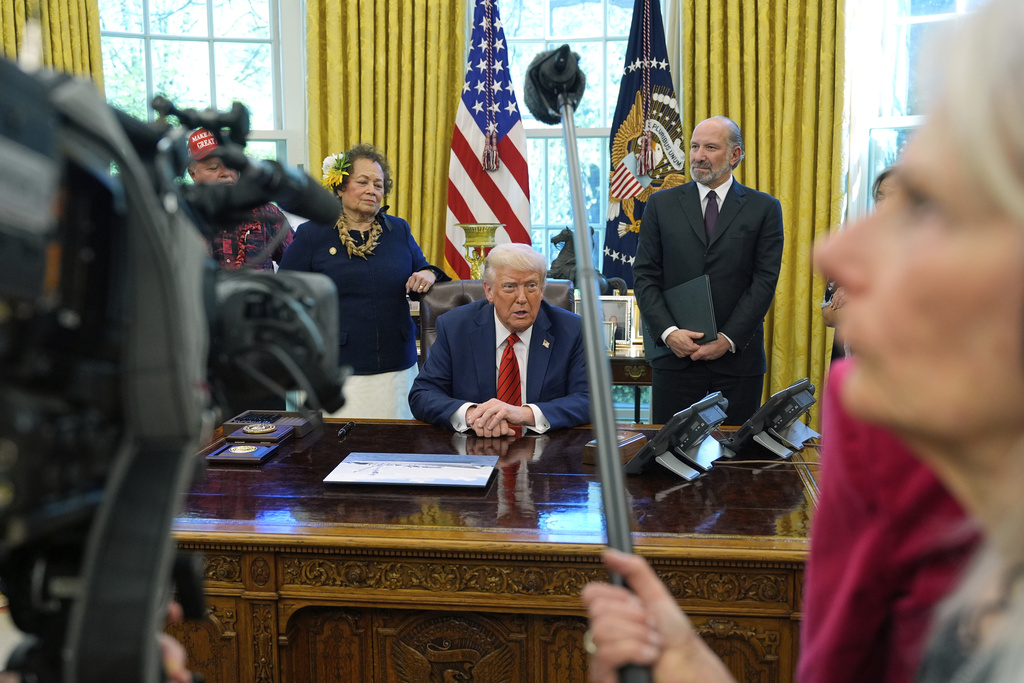 The Latest: Trump says trade deals could be done within a month