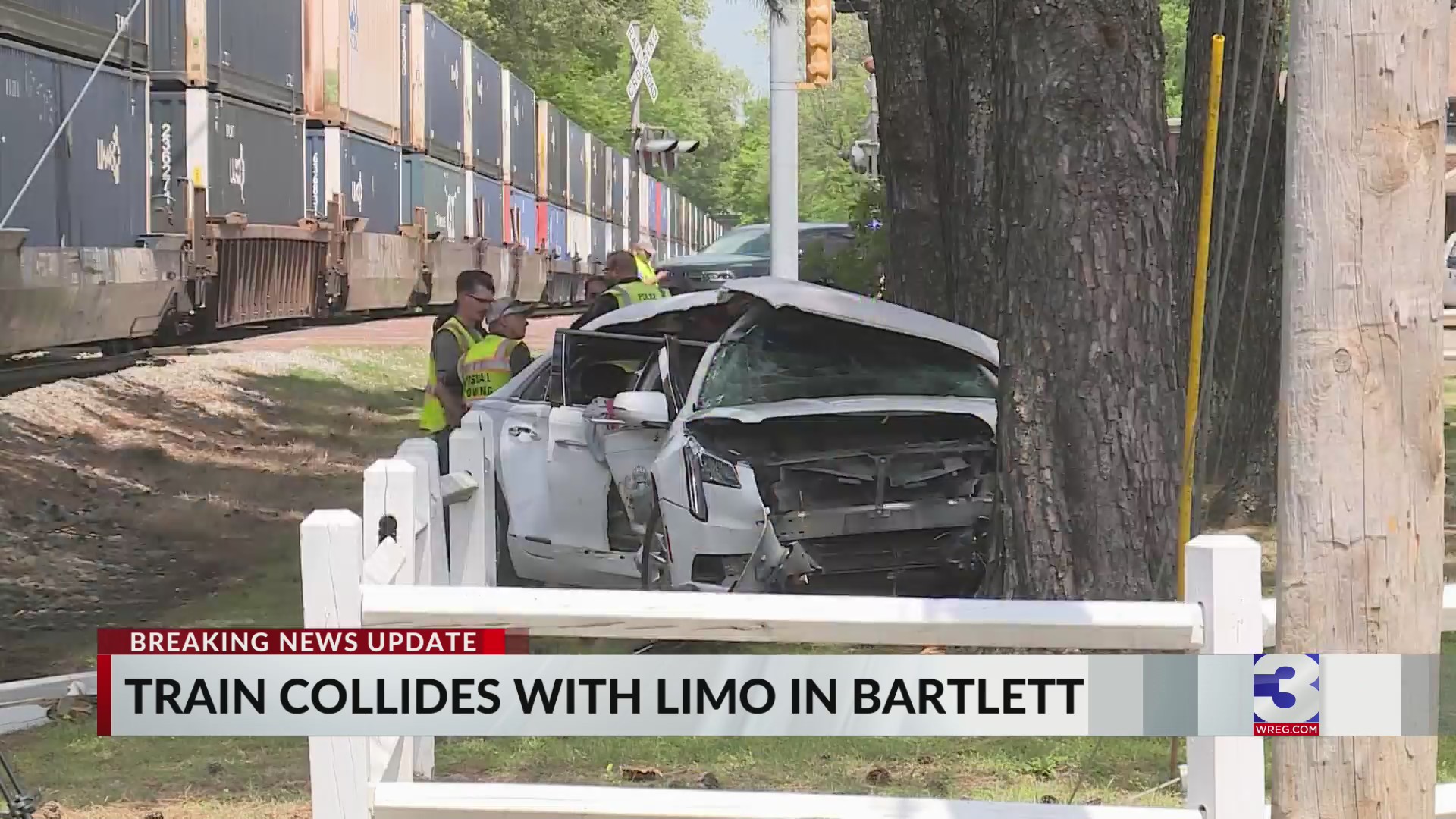 Train collides with limo in Bartlett