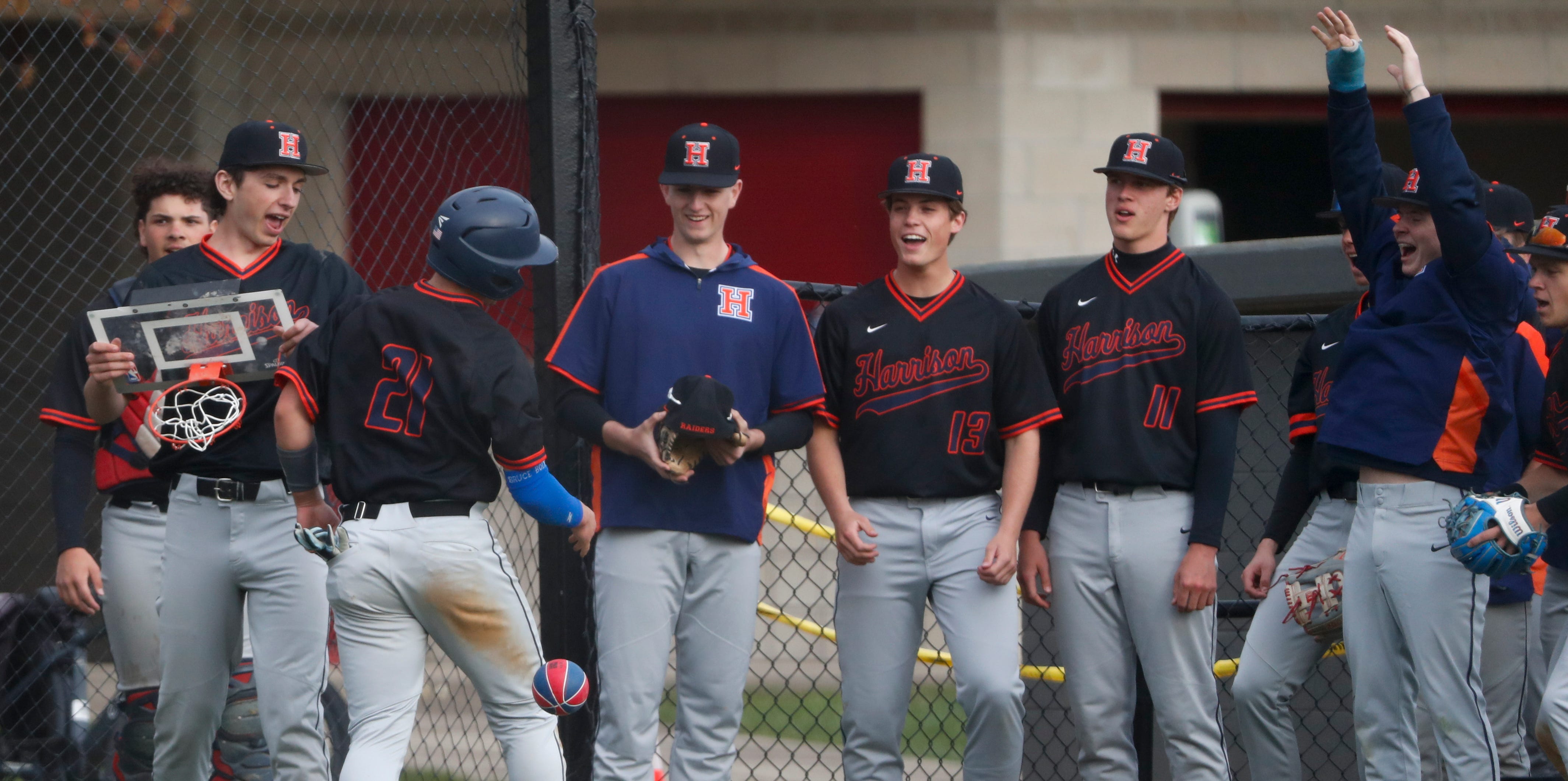 The origin story of Harrison baseball's new dunking tradition
