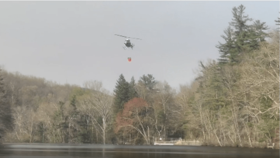WATCH: Helicopter scoops water from lake at Michaux State Forest