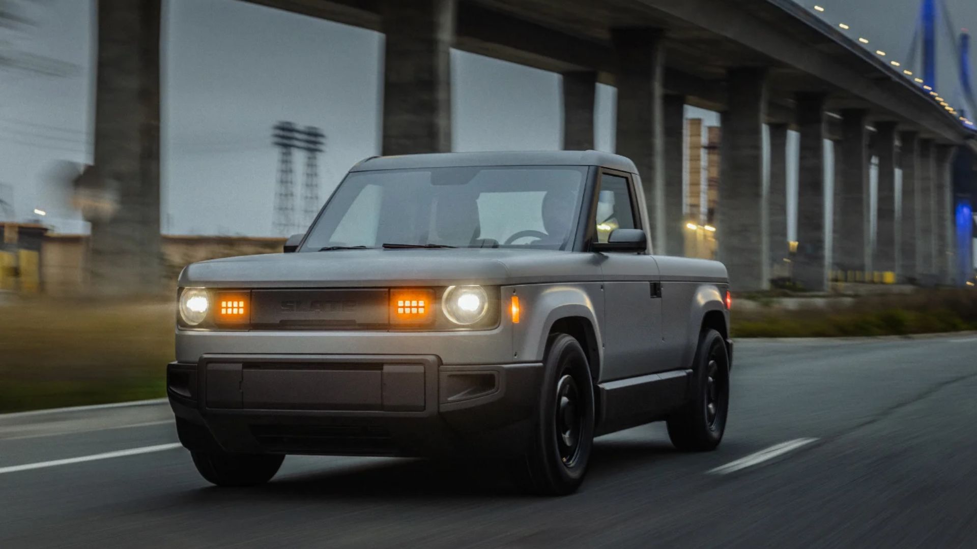 Photos: Jeff Bezos-backed firm launches electric pickup truck with 150 ...