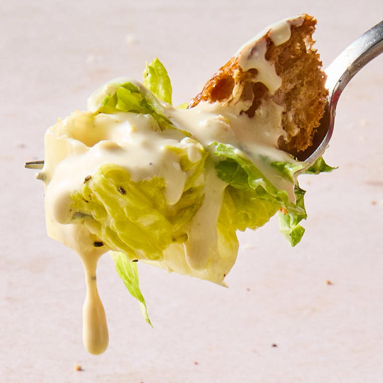 The Key To My Perfect Caesar Salad Is All In The Dressing