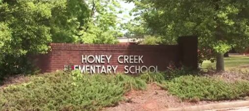 Racial signs over fountains at Ga. school draw fire from NAACP, parents