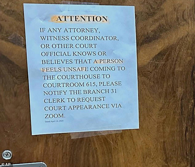 Revealing courtroom sign erected by judge Hannah Dugan arrested by FBI ...