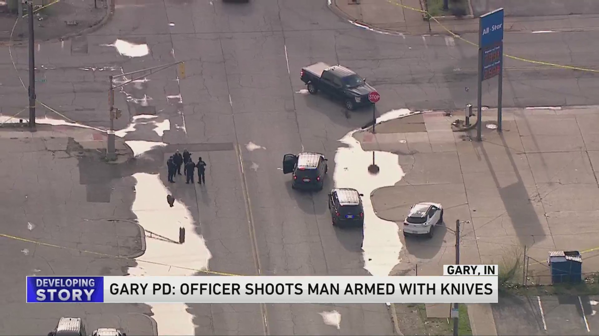 Gary police officer shoots man armed with knives