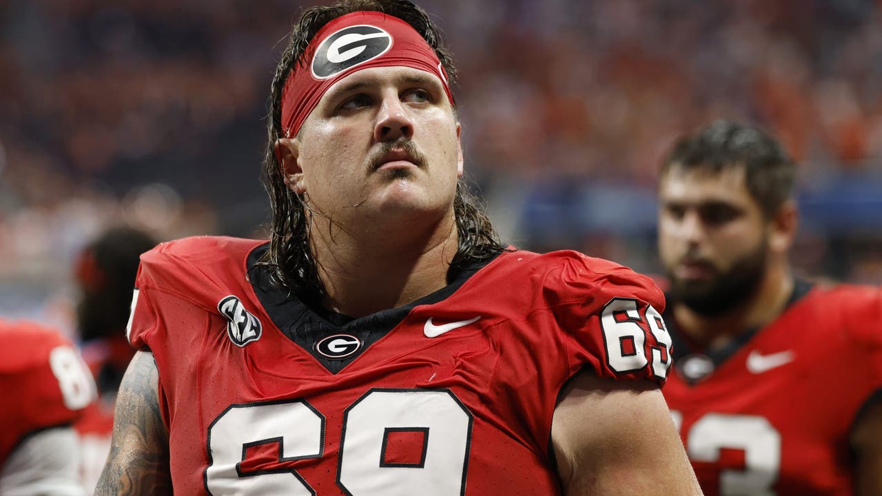 Lions trade up to draft guard Tate Ratledge in 2nd, receiver Isaac ...