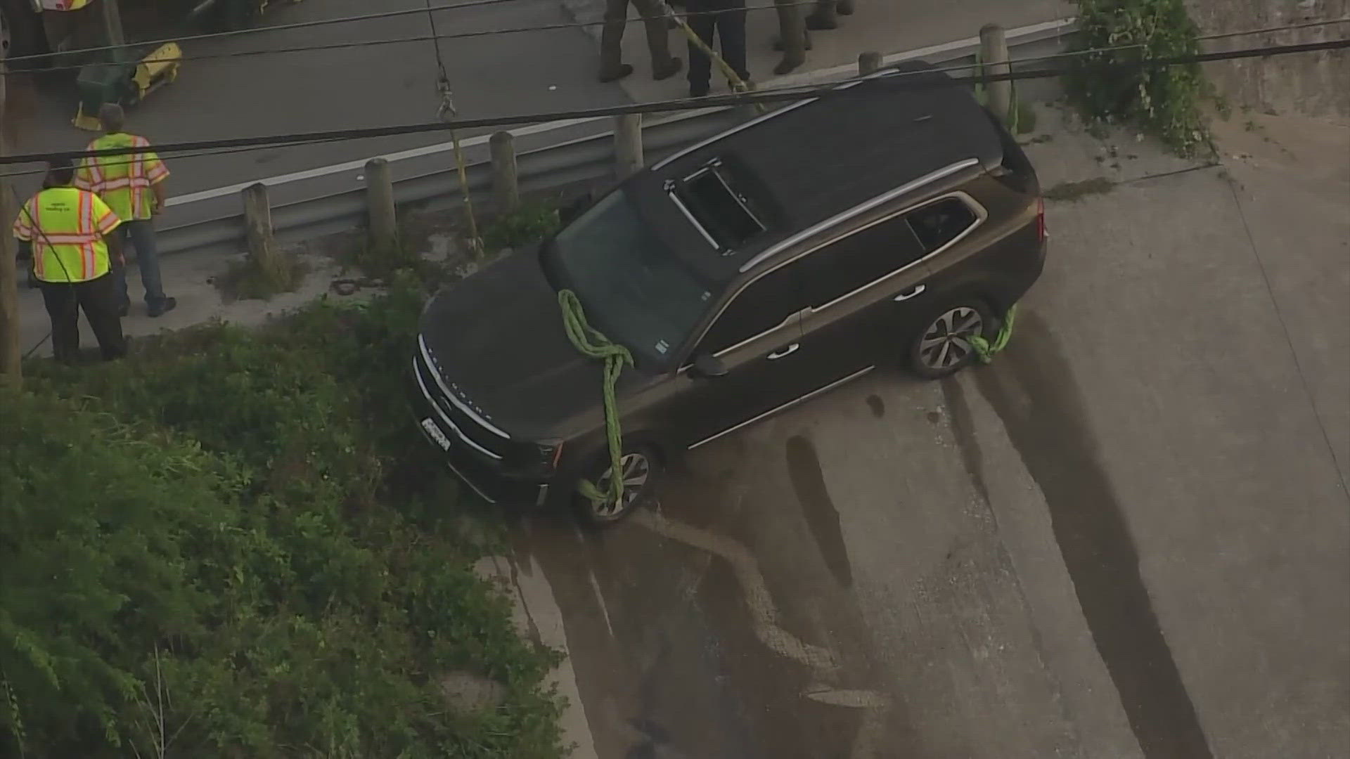 Woman and 1-year-old die after vehicle plunges into water in ...