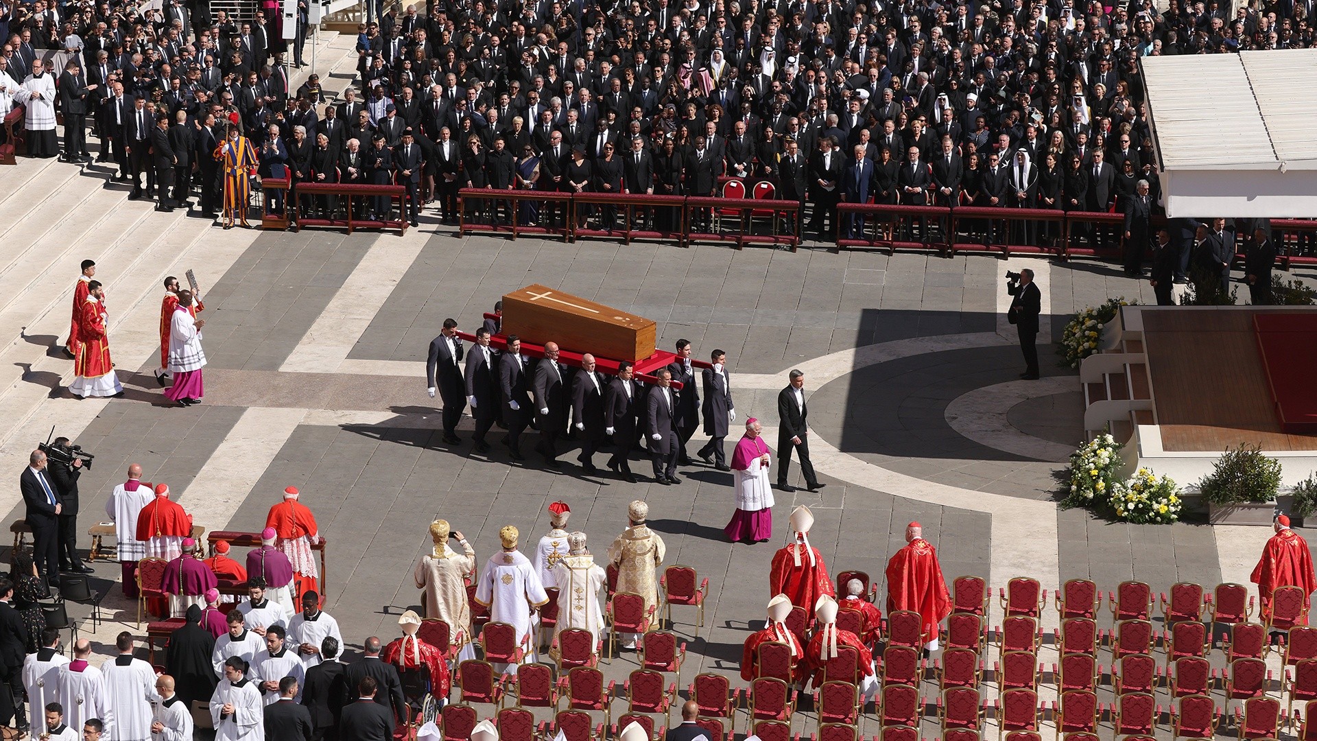 Pallbearers carry Pope Francis' coffin out into St. Peter's Square