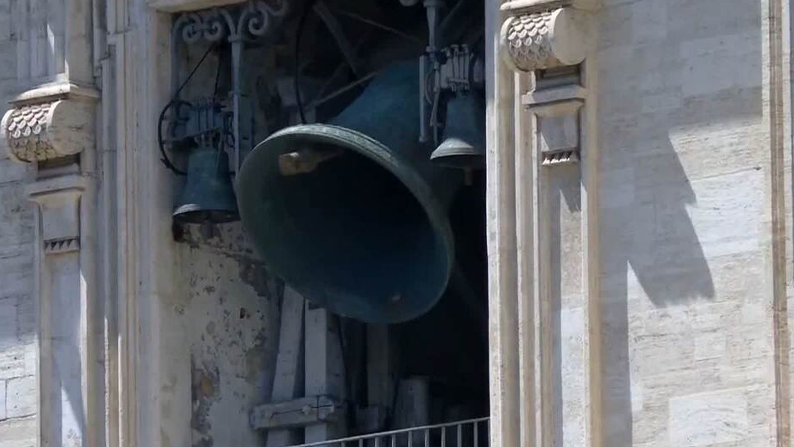 10-tonne bell rings as coffin carried through 'door of death'