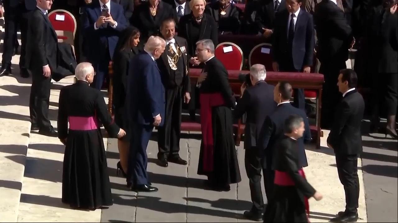 Trump and Biden arrive for pope's funeral