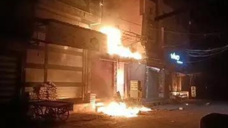 Shops torched, cops injured: Mosque announcement sparks communal ...
