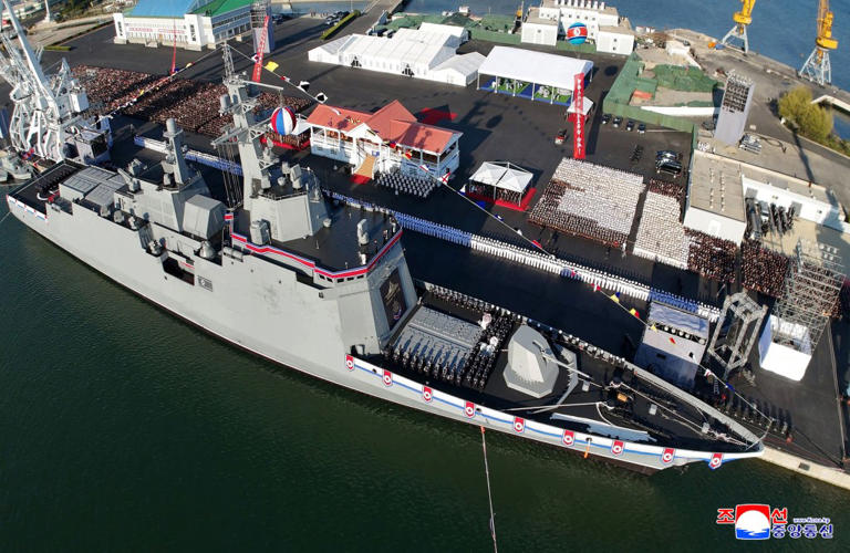 North Korean leader Kim Jong Un touts new naval destroyer with daughter, blames US for tensions