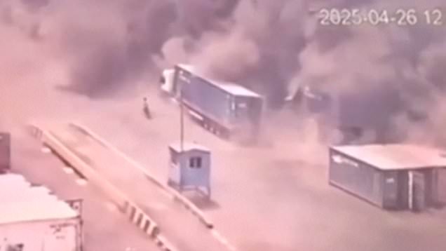 Workers run in fear as Iranian chemical warehouse explodes