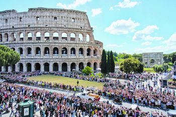 Pope's procession: Coffen passes through Rome's historic Colosseum