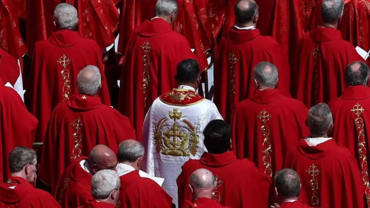 Who is Cardinal George Jacob Koovakad, the priest adorning a white ...