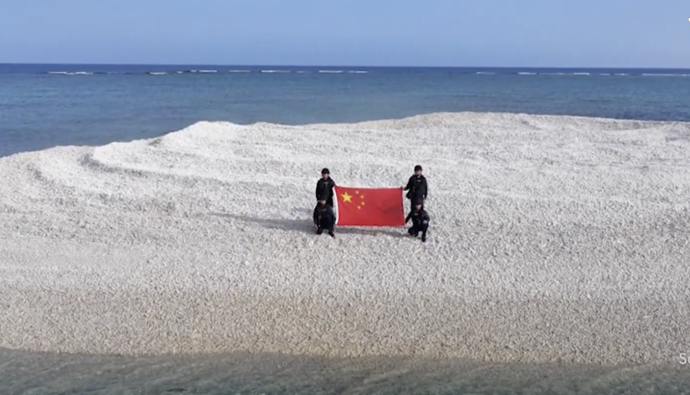 China plants flag, escalates South China Sea tussle with Philippines