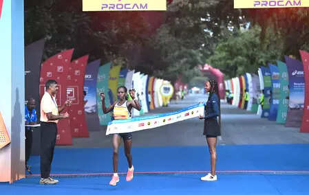 Uganda’s Joshua Cheptegei and Sarah Chelangat clinch titles