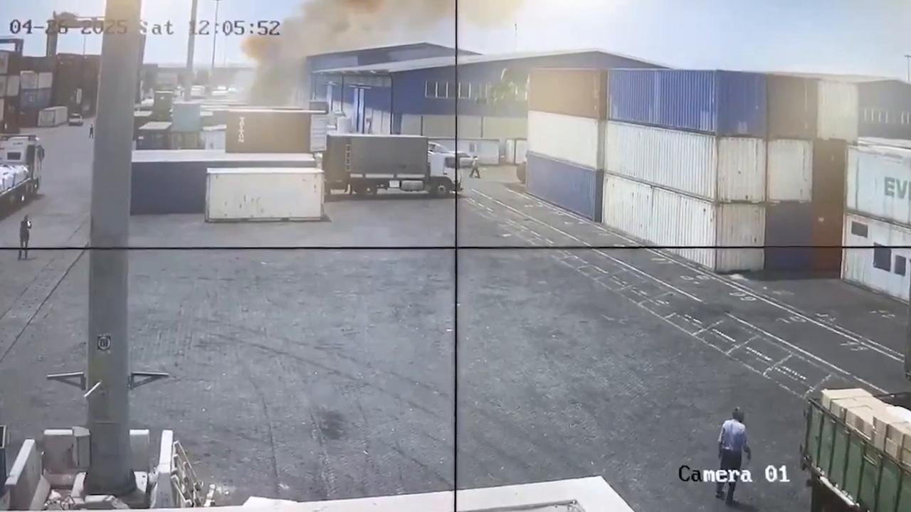 Shipping container bursts into flames at port in Iran