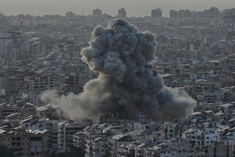 Smoke billows from Beirut suburbs after third Israeli strike since ...