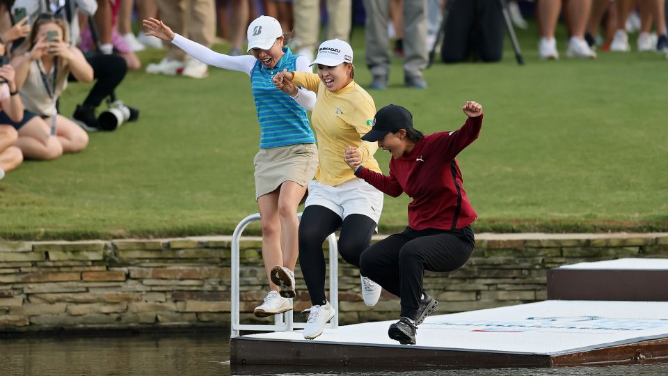 Japanese golfer Mao Saigo celebrates first major trophy by jumping in a ...