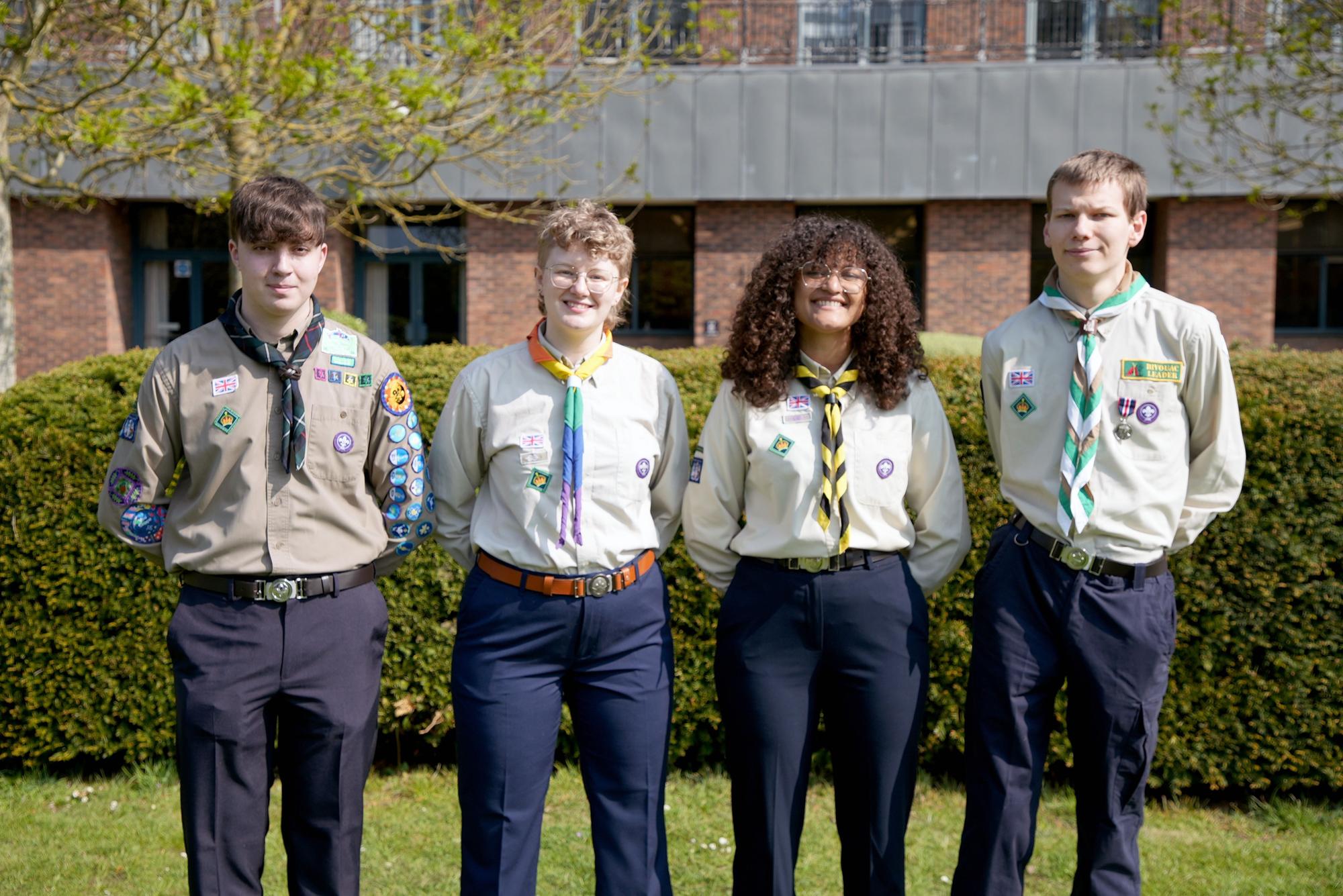Chief Scout, Dwayne Fields congratulates Peter Wolffson and Reo ...