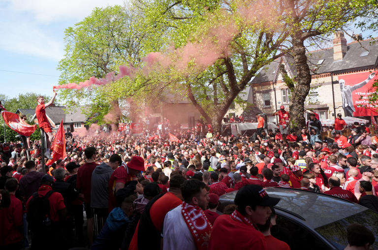 The epic reason behind blue flares in Liverpool’s title celebrations at ...