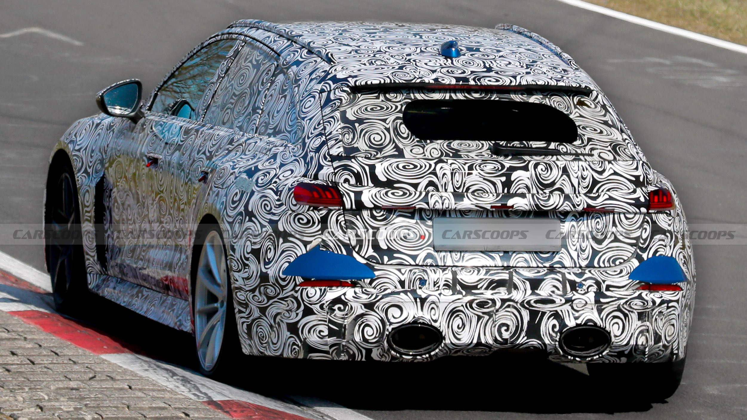 New Audi RS5 Flexes Massive Exhausts And A Plug In Power Surge