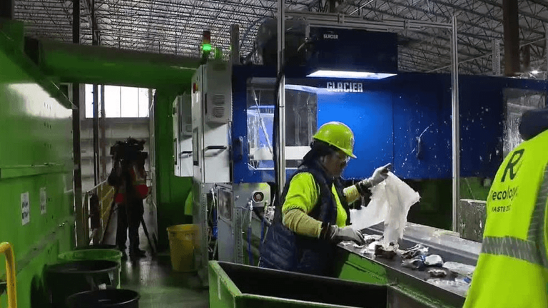 Recycling plant uses AI-equipped robots to sort through recycled waste ...
