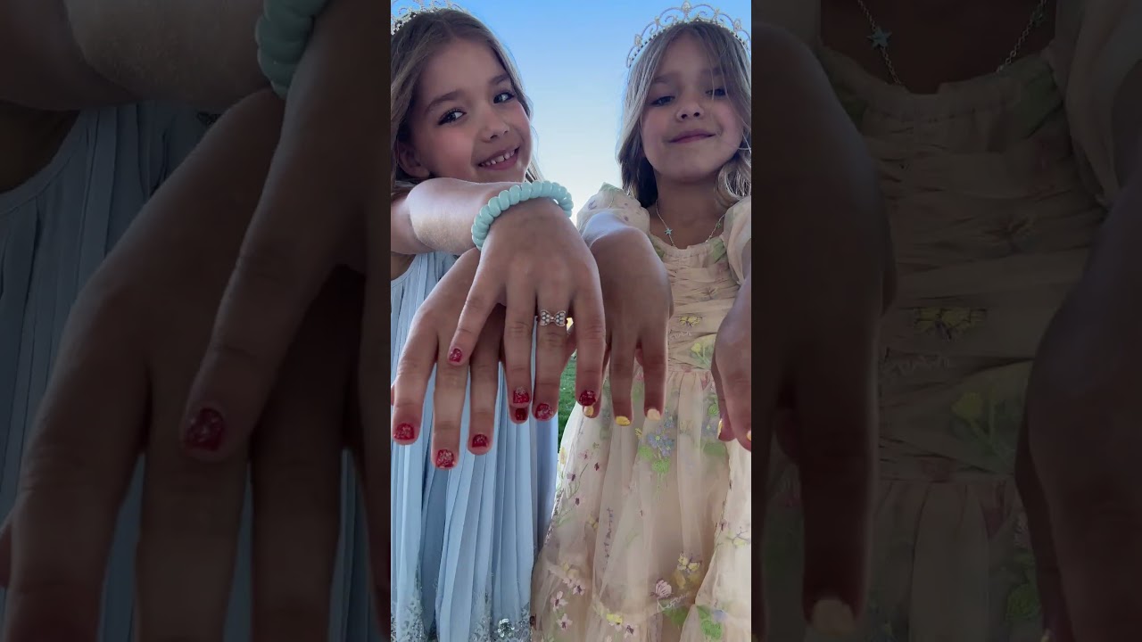 Adorable twins show off their matching outfits of the day