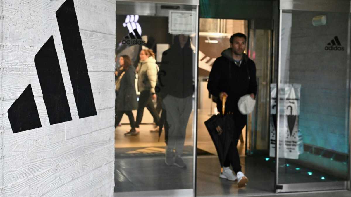 Adidas reports hit from US tariffs