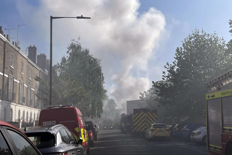 Flats evacuated as 100 firefighters tackle substation blaze in west London