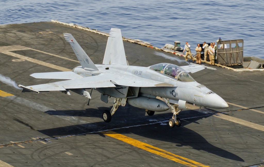 US fighter jet worth over $60,000,000 rolls off ship into sea