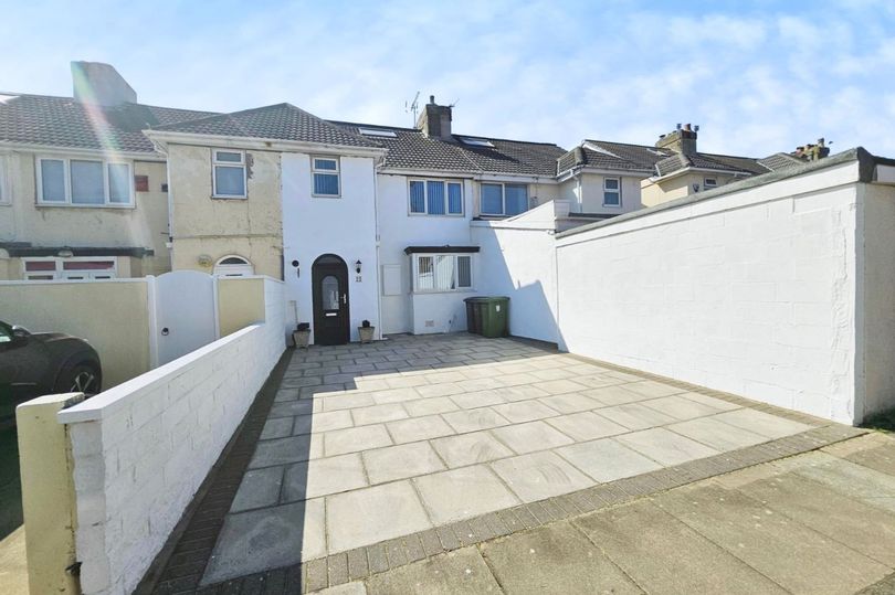 'Ideally situated' terraced home in 'beautiful beachside location' for sale