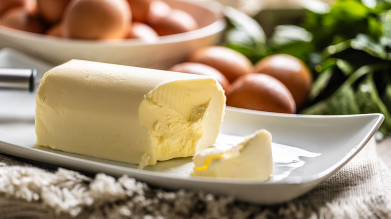 Does The Butter In Your Fridge Smell Like Cheese? There's A Reason Why