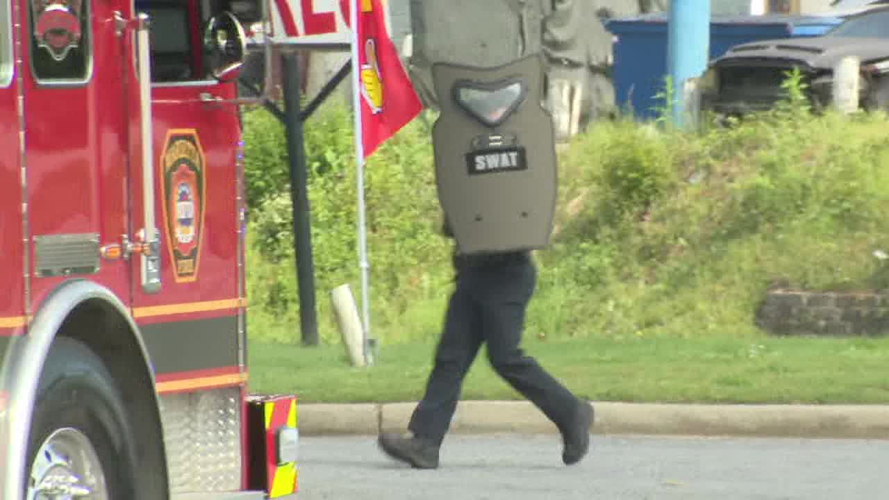 Shots fired at Marietta auto shop results in SWAT standoff, 1 arrested