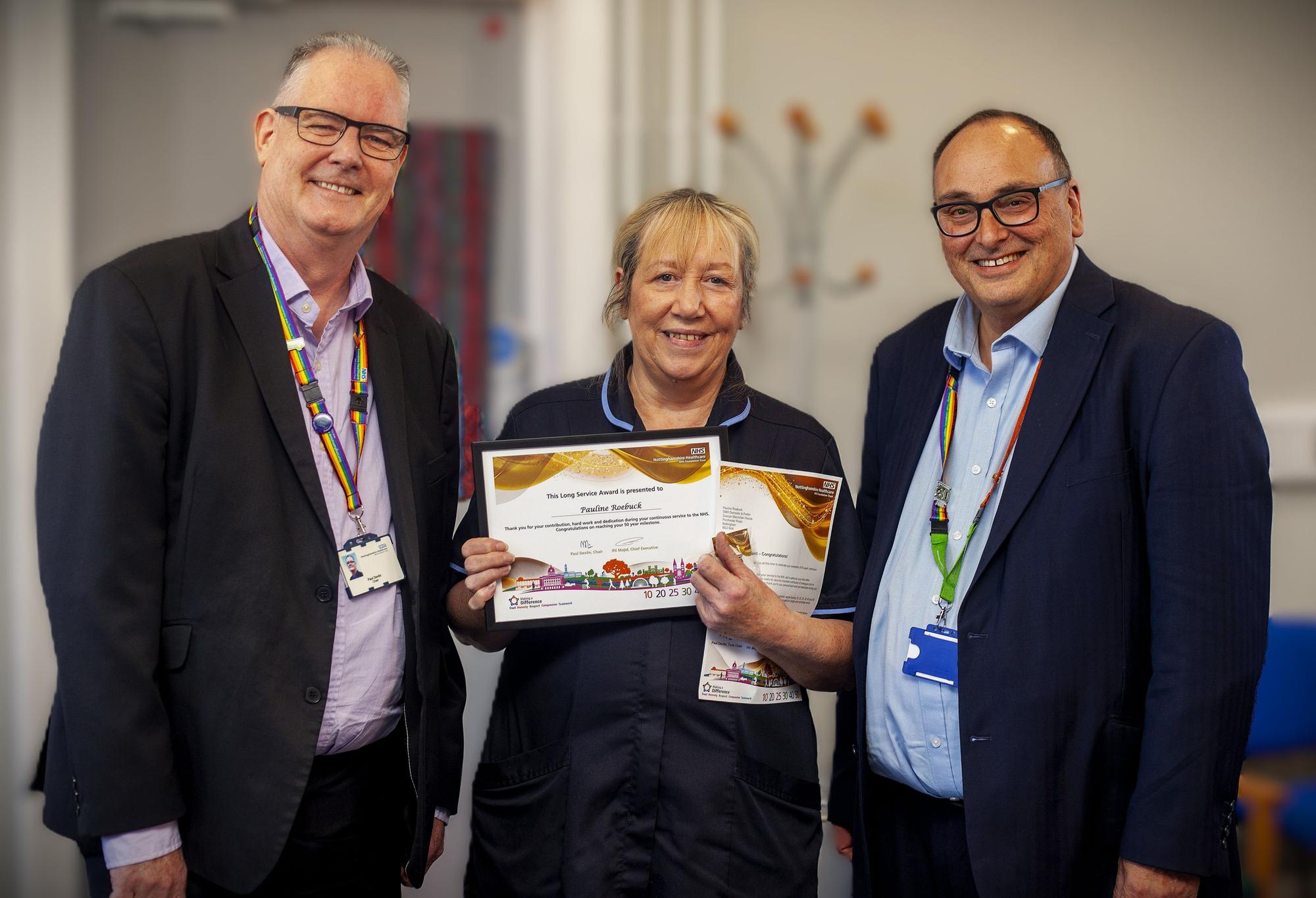 50 years and still shining – NHS cleaner mops up five decades of service