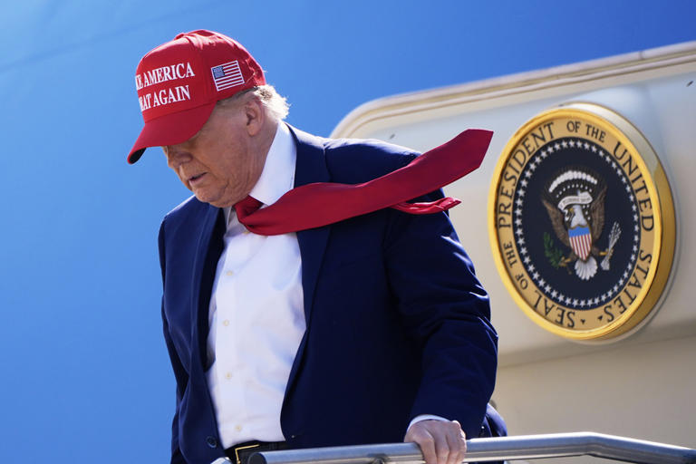 Trump greets Whitmer with a hug and gives her a win — new jets for ...