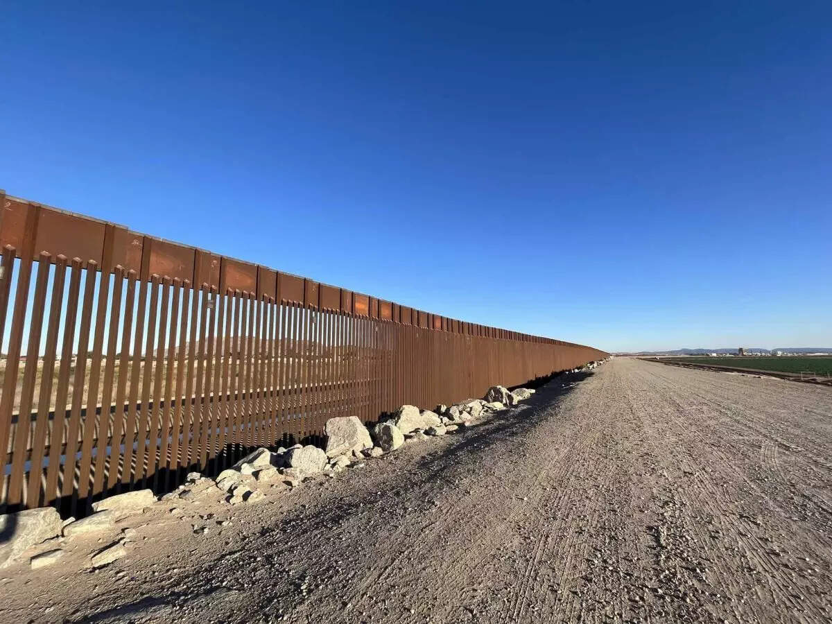 First migrants charged for entering military zone on US border