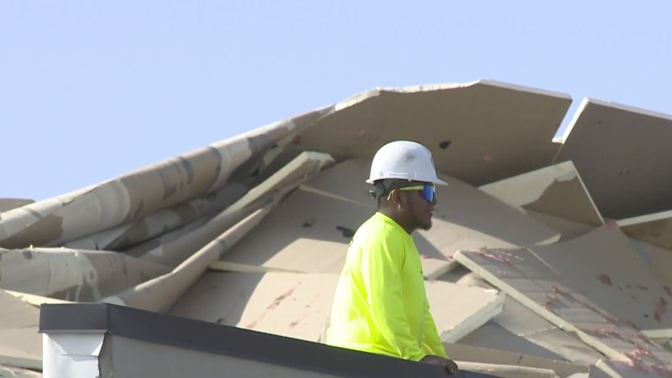 Storm damage to Rolladium roller rink in Waterford Township
