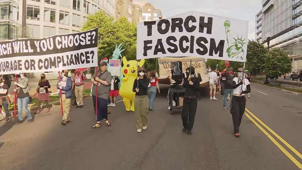 Protesters block DC rush hour to mark 100 days of 'Trump regime'