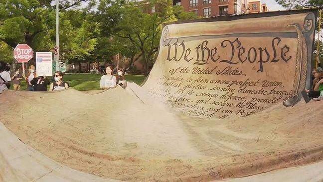 Protesters block DC rush hour to mark 100 days of 'Trump regime'