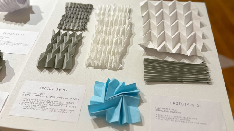 Princeton art student designs quantum memory drive dress with origami folds