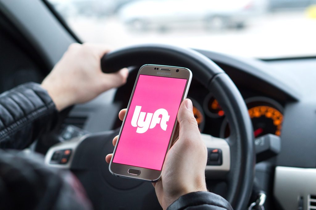 Lyft driver settles with woman who jumped from car