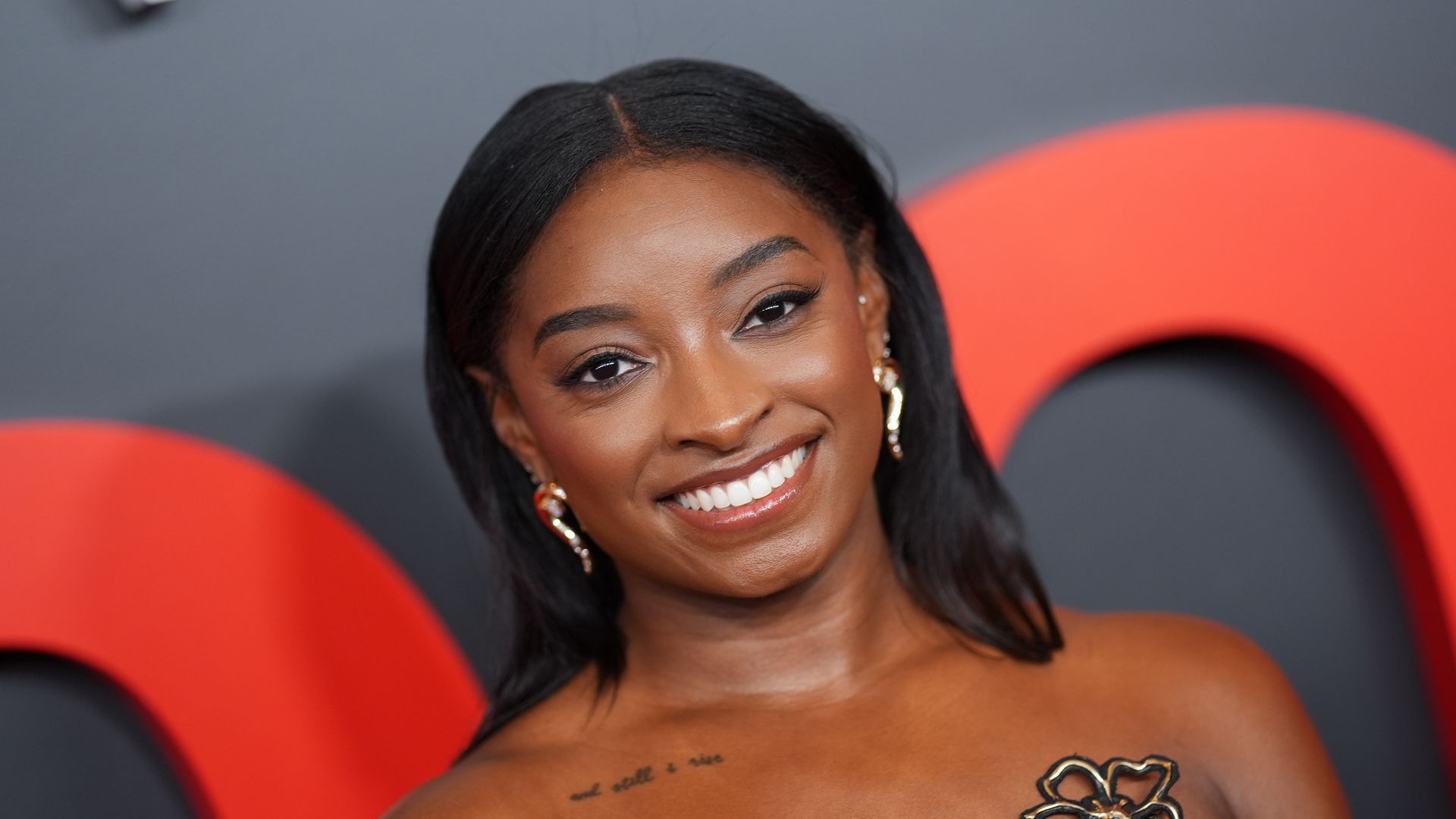 Simone Biles celebrates baby news in the family beside Jonathan Owens ...