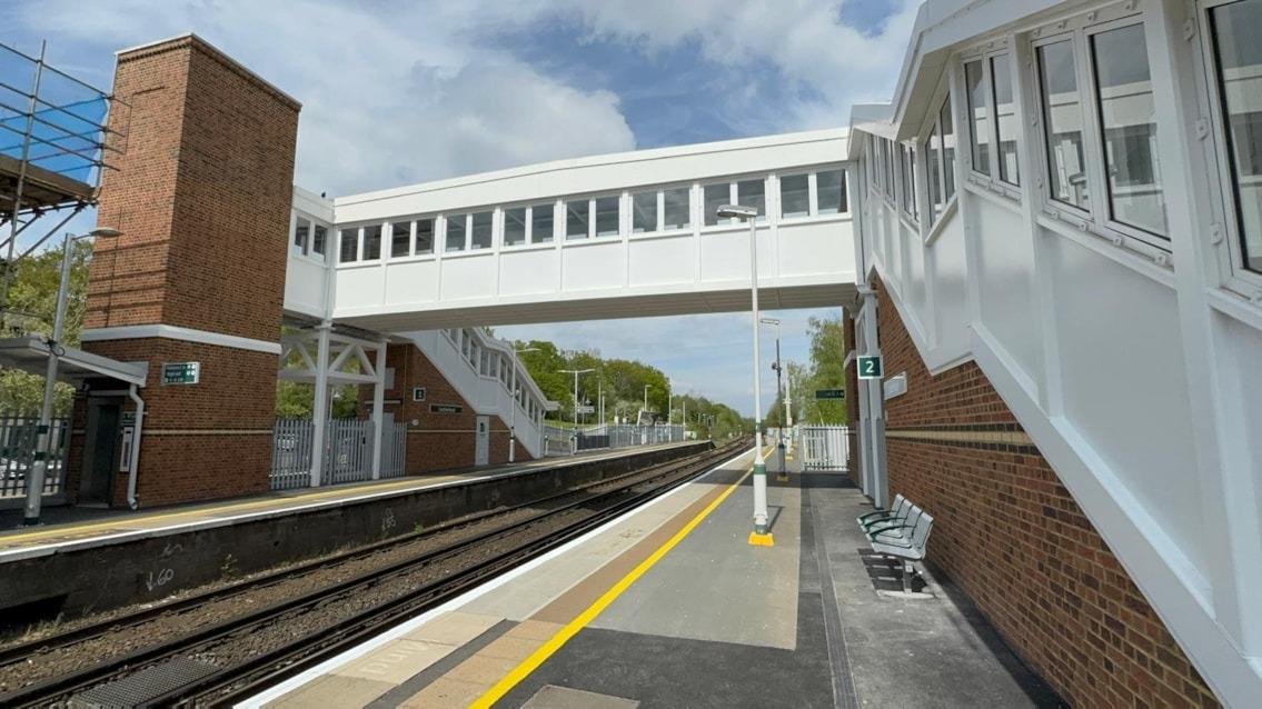 Two new lifts and footbridge installed at Surrey station to improve ...