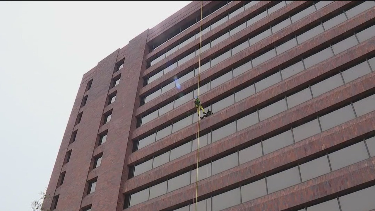 Going over the edge: Rappelling trend takes off in Itasca