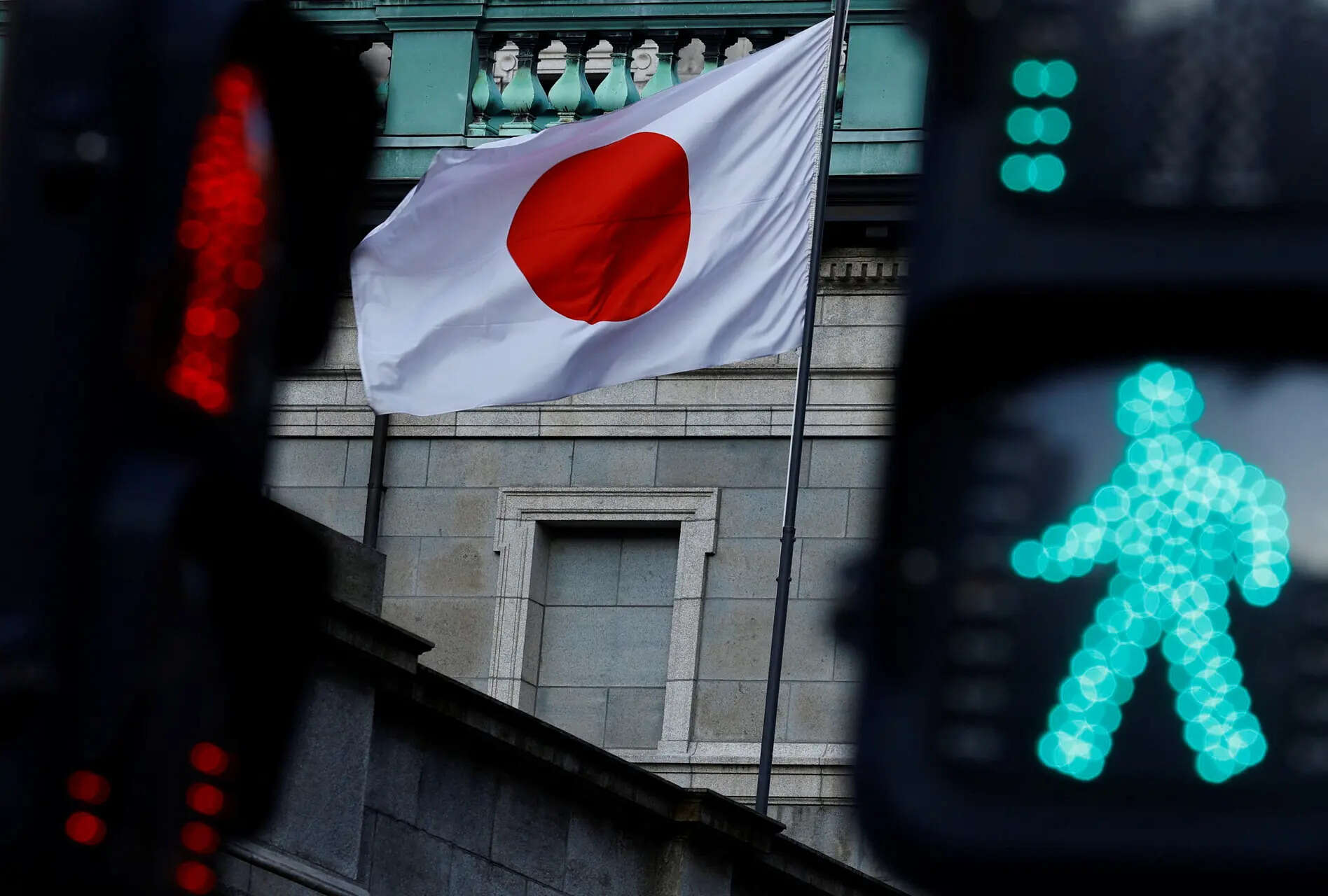 BOJ keeps rates steady, cuts growth forecasts