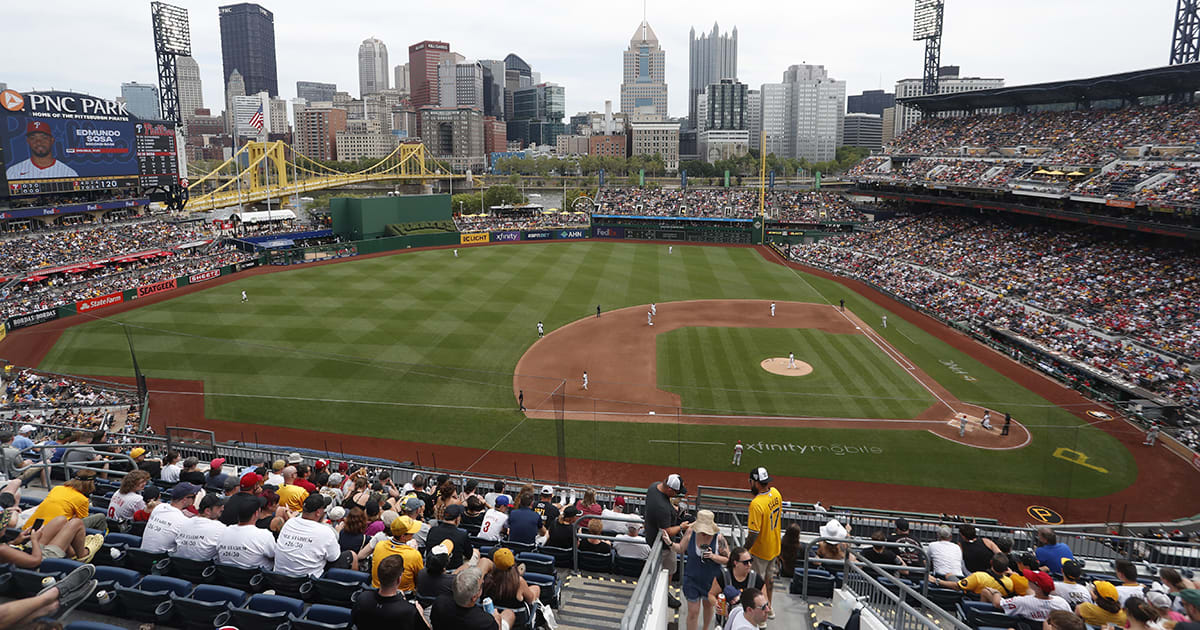Fan stretchered off after scary fall over outfield wall during Cubs vs ...